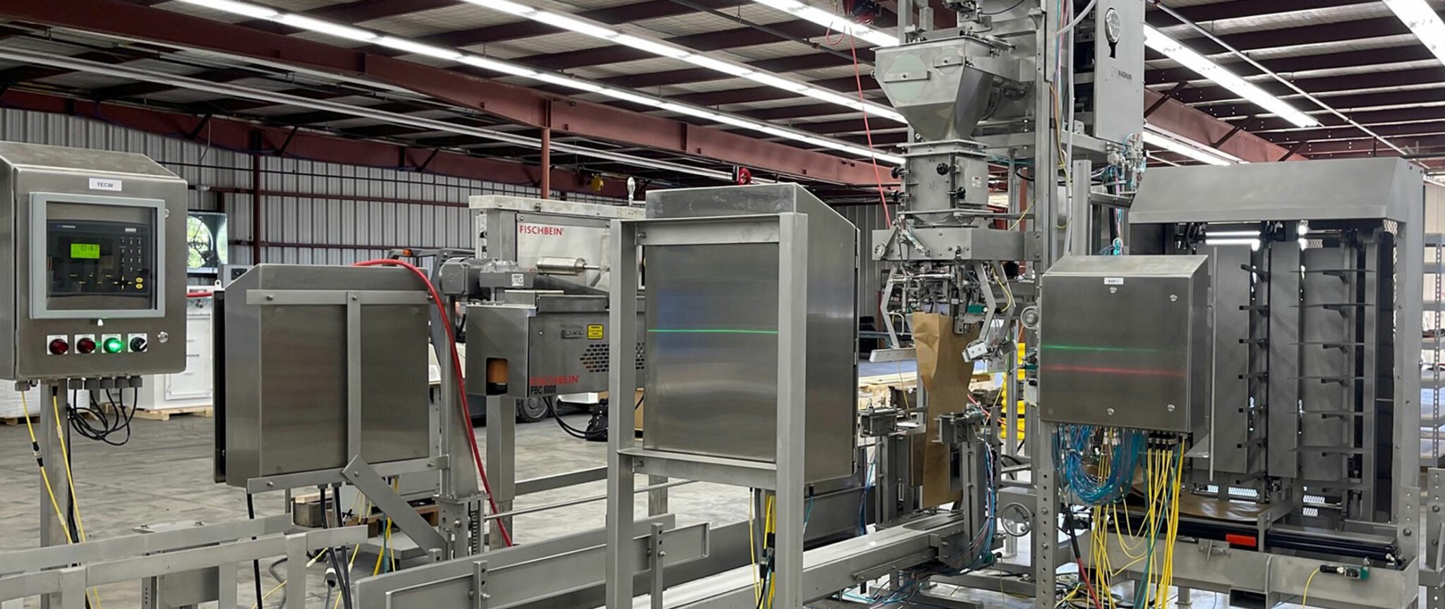 Automated-Open-Mouth-Packaging-System - Magnum Systems Inc